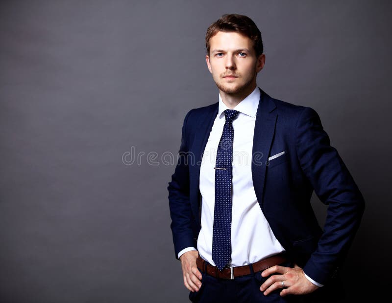 Cool Businessman Standing on Grey Stock Photo - Image of modern, adult ...