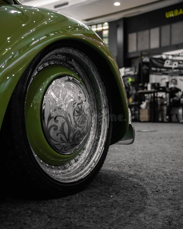Cool Car Wheels at an Auto Show Editorial Image - Image of light, green ...