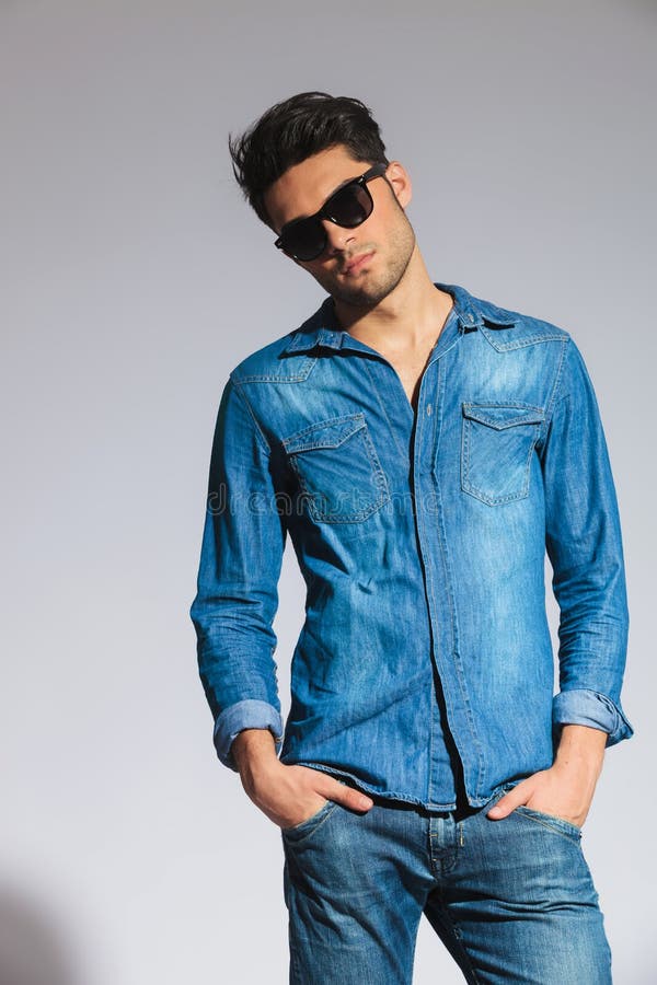 Cool Old Man Standing with Hands in Pockets Against Wall Stock Image ...