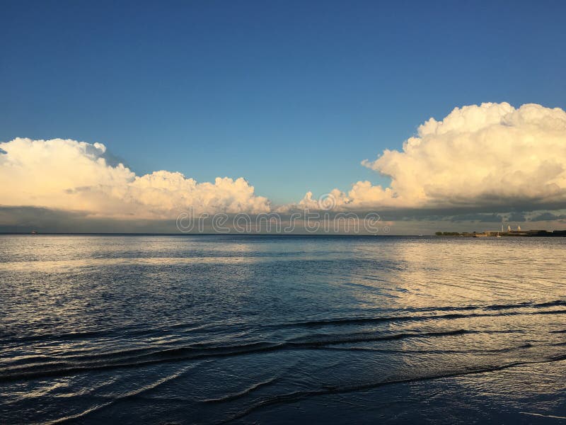 Cool Clouds Over the Water stock photo. Image of lakemichigan - 165314066