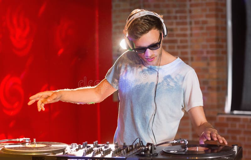 Cool dj spinning the decks stock image. Image of smiling - 48995475