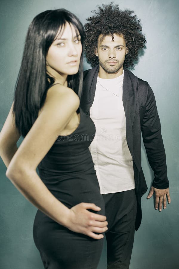 Cool Elegant Model Couple Posing in Studio Looking at Camera Stock ...
