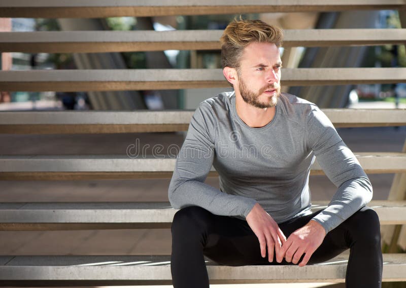Cool Fit Man Sitting on Steps Outdoors Stock Image - Image of fitness ...