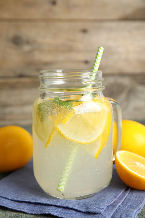 Cool Freshly Made Lemonade in Mason Jar on Table Stock Image - Image of ...
