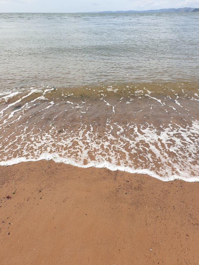 Cool Gentle Waves on the Sand Stock Photo - Image of mudflat, wave ...