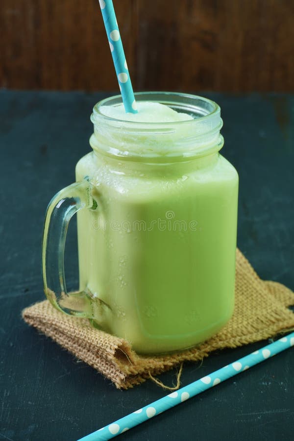 Cool green tea drinks stock photo. Image of bottles - 191919388