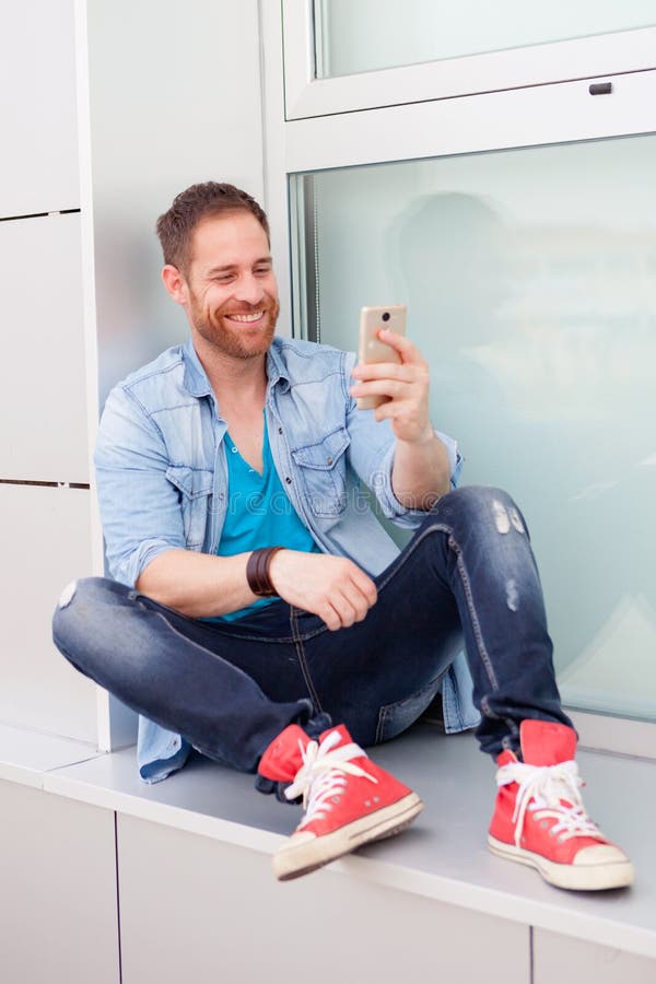 Cool Guy with a Mobile during His Rest in the Office Stock Image ...