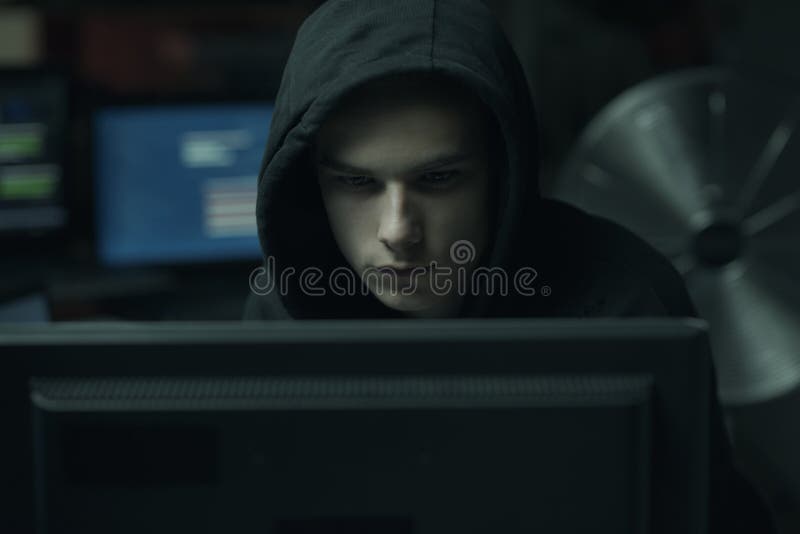 Cool Hacker with Hoodie Working with Computers Stock Photo - Image of ...