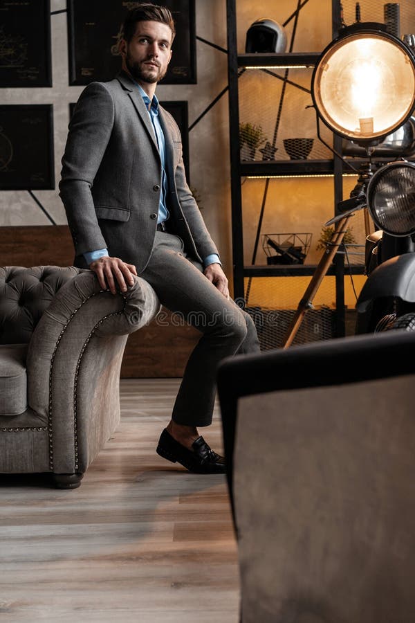 Cool and Handsome. Good Looking Young Man in Full Suit Sitting on the ...