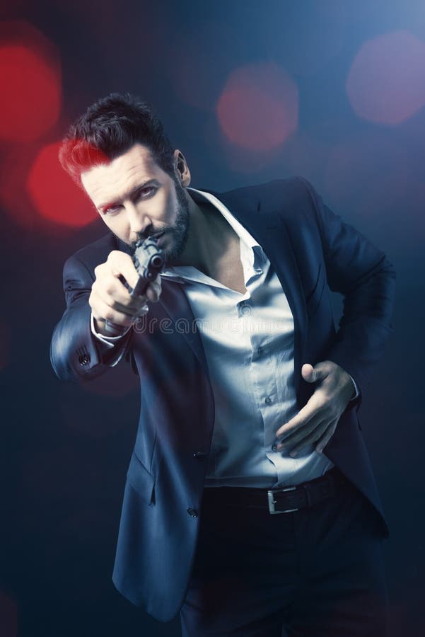 Cool Handsome Man Pointing a Gun Stock Photo - Image of holding ...