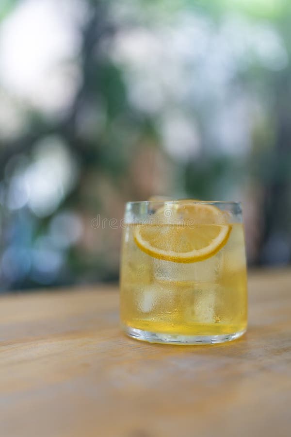 Cool Honey Lemon in a Clear Glass with Lemon Slice Stock Photo - Image ...