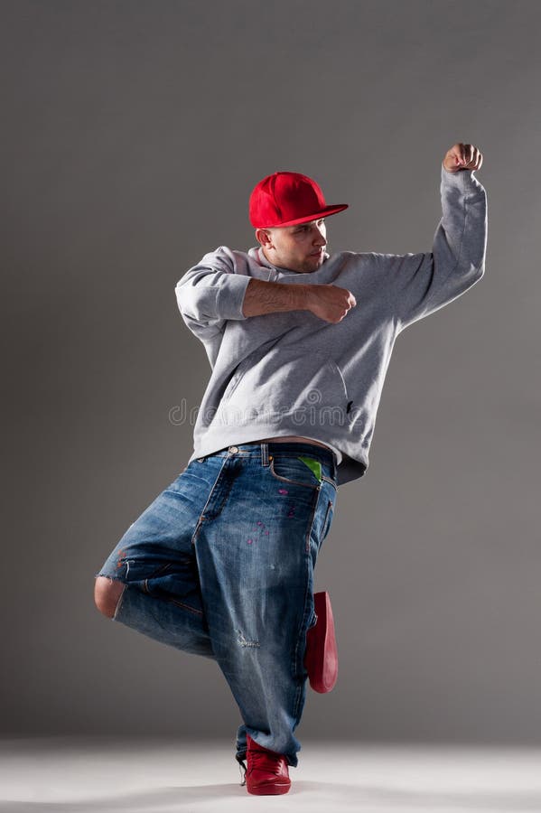 Hip-hop guy dancing stock image. Image of casual, sneakers - 16434163