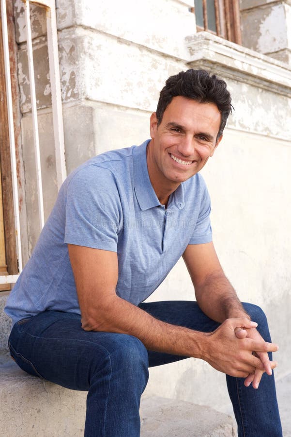 Cool Middle Age Man Sitting and Smiling Stock Photo - Image of handsome ...