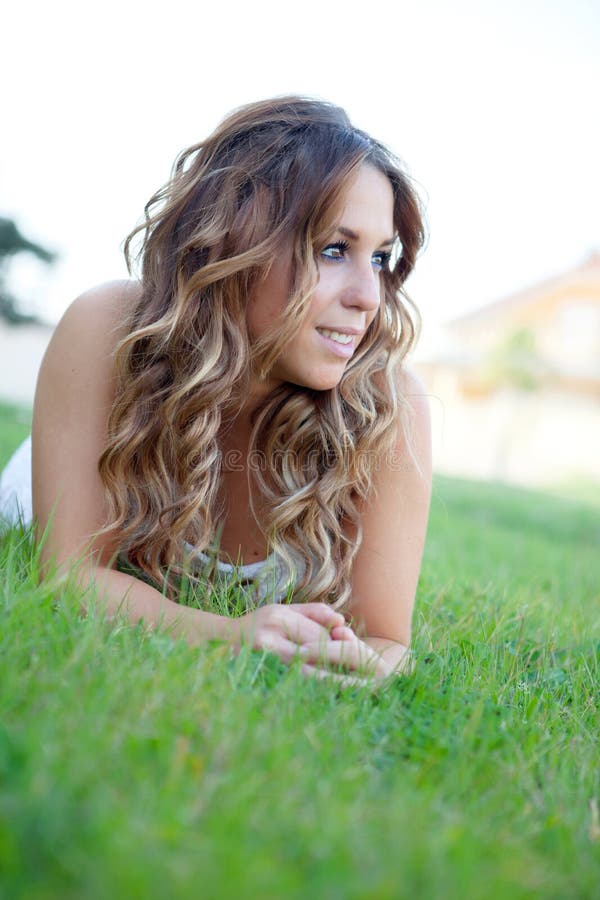 Cool Pretty Girl Lying on the Grass Stock Image - Image of adult ...