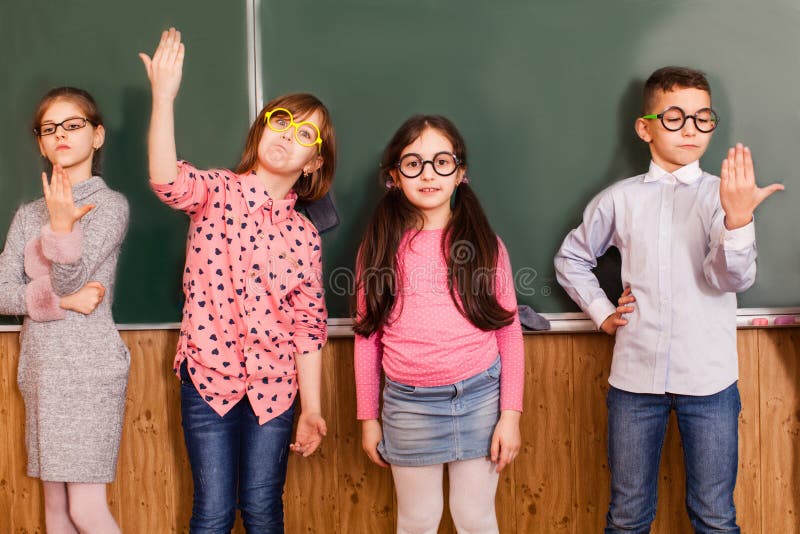 Cool Pupils in Glasses Have Fun Together during the Break Stock Image ...