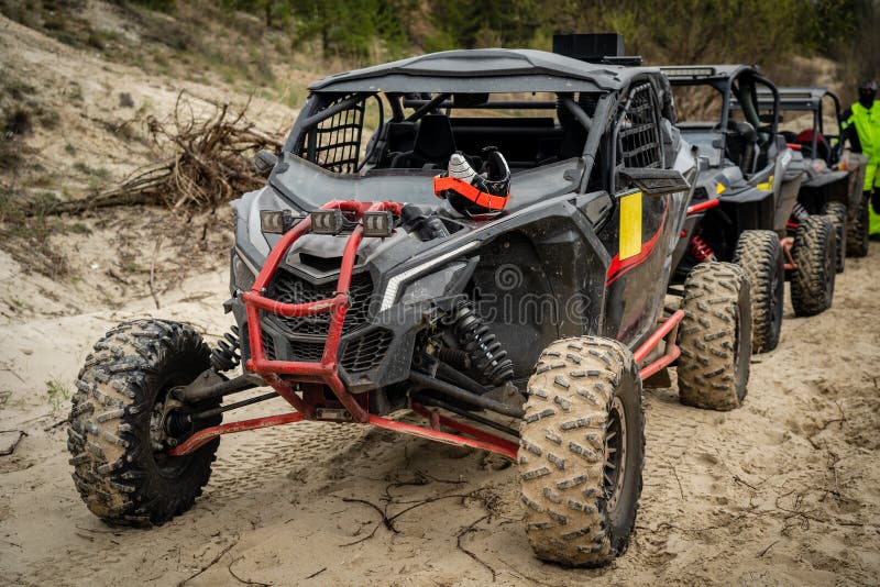 Cool Quads Stand in a Row on Sand before Competition Editorial ...