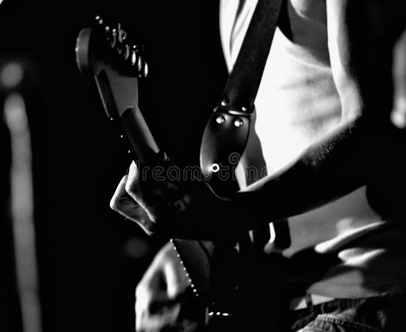 Cool rocker playing guitar stock image. Image of performance - 2871451