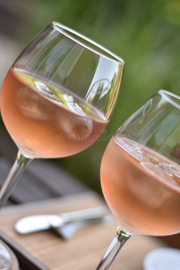 Glasses of Rose Wine on the Table Stock Image - Image of closeup, wine ...
