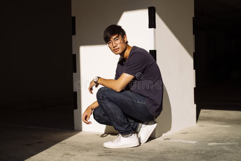 Cool Guy Sitting on the Floor Stock Photo - Image of close, legs: 3197168