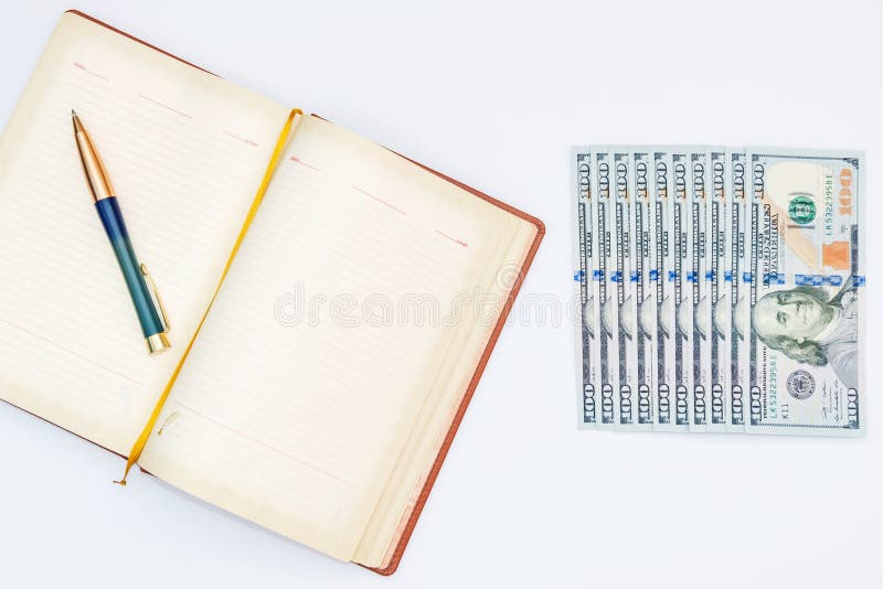 Dollars, Notebook and Pen with White Background. Isolated Stock Photo ...