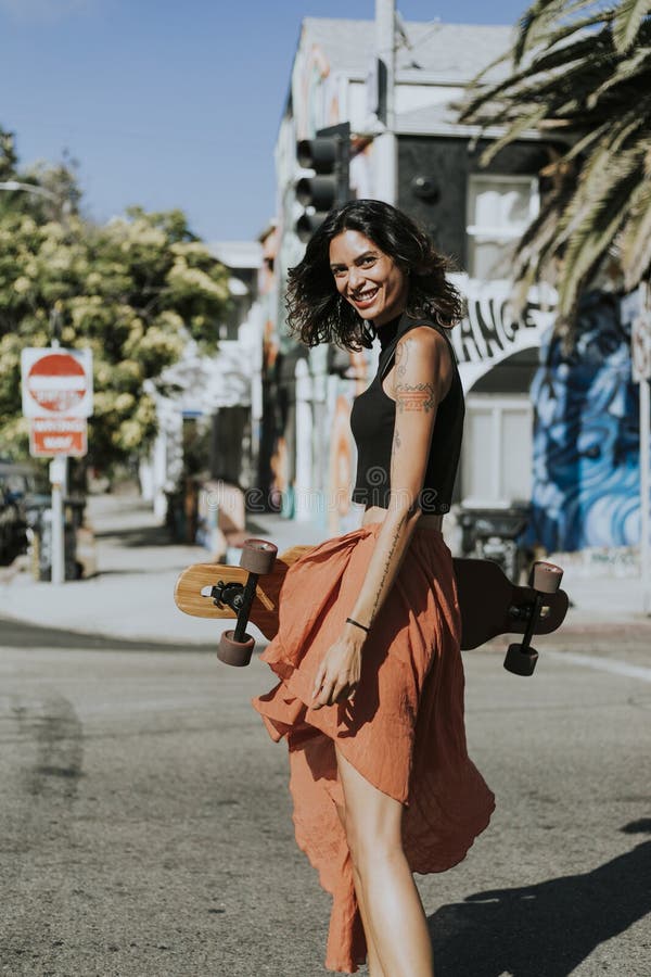 Cool Woman with a Longboard Stock Photo - Image of downtown, female ...