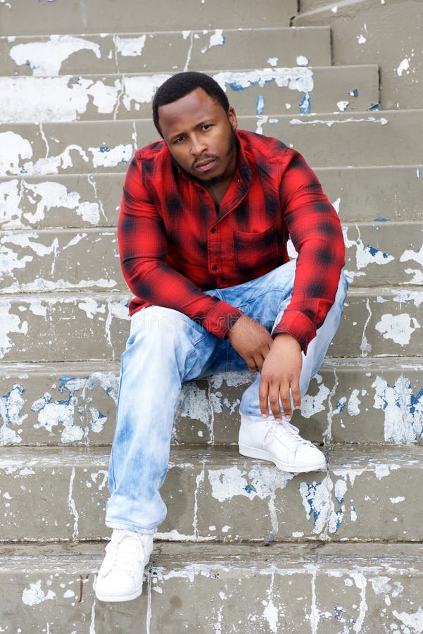Cool Young Black Guy Sitting on Steps Outside Stock Photo - Image of ...