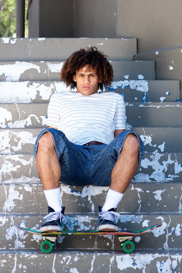 Cool Young Guy Sitting on Steps with Skateboard Stock Image - Image of ...
