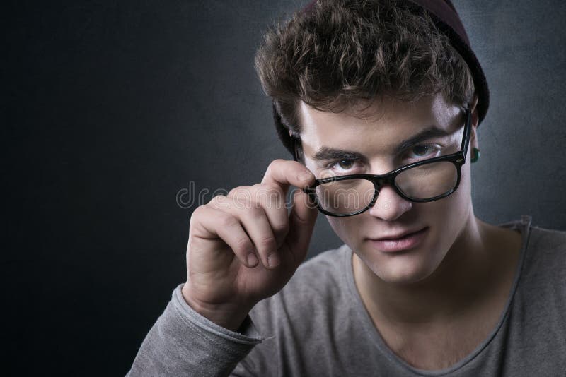 Cool Young Man Adjusting His Glasses Stock Image Image Of Culture