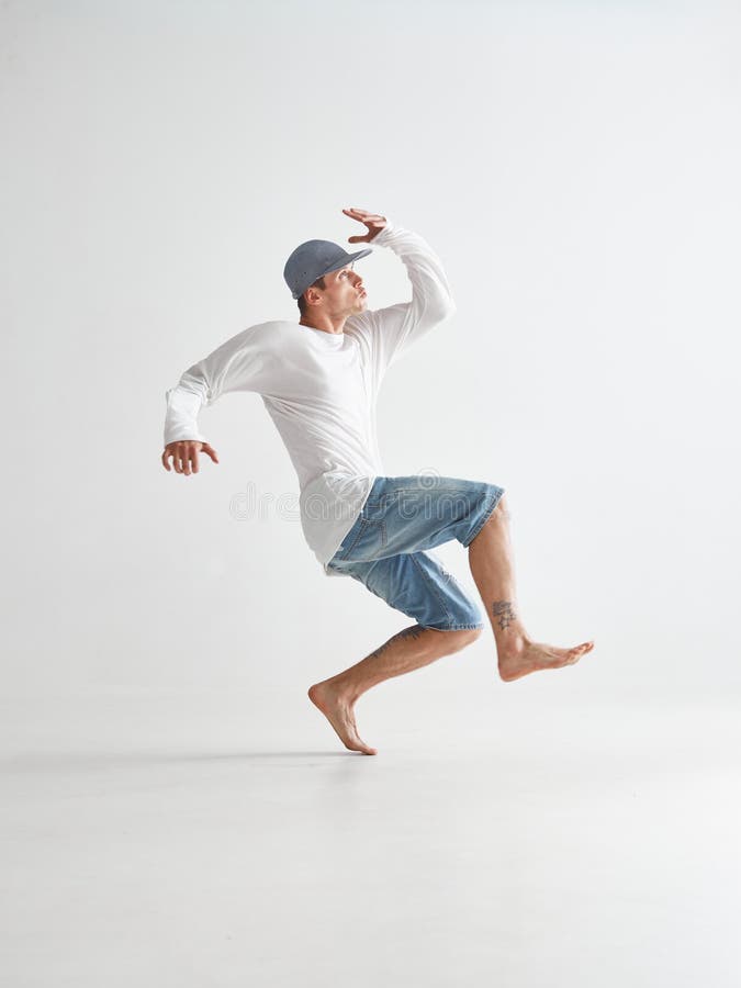 Cool Young Man Breakdancer Dancing Expressive Dance in White Studio ...