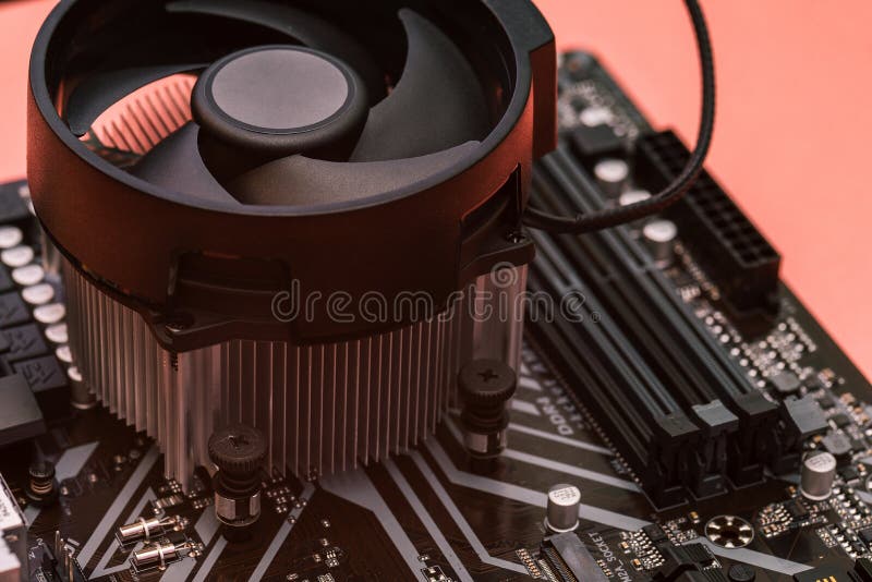 Cooler with a Fan is Installed on a Computer Motherboard. the Cooling ...