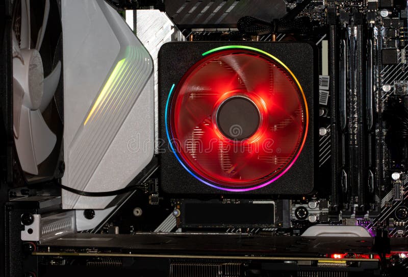 Computer Circuit Board and CPU Cooling Fans Illuminated by Internal ...