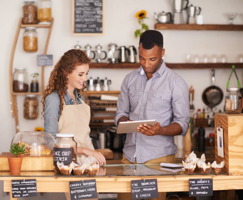 The Coolest Cafe in Town. Shot of Two People in a Cafe. Stock Image ...