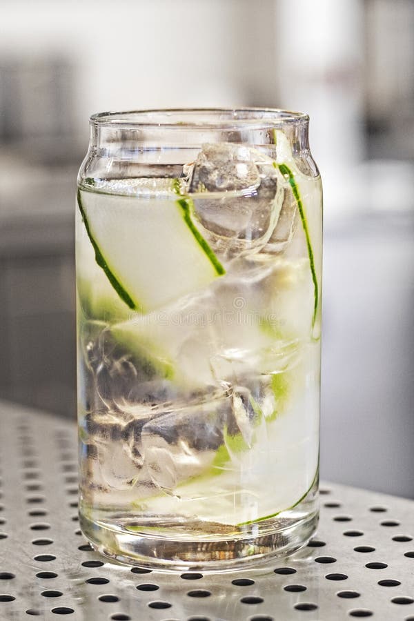 Cooling Cocktail with Cucumber, Sprite and Ice Cubes Stock Image ...