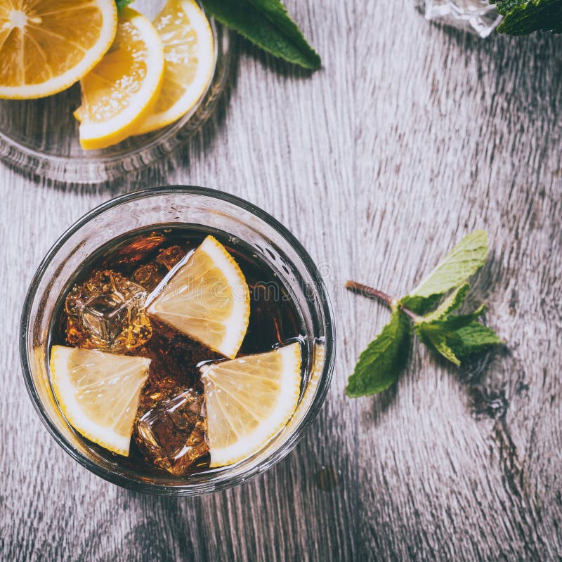 The Cooling Drink with Ice, Lemon and Mint. Stock Photo - Image of cola ...