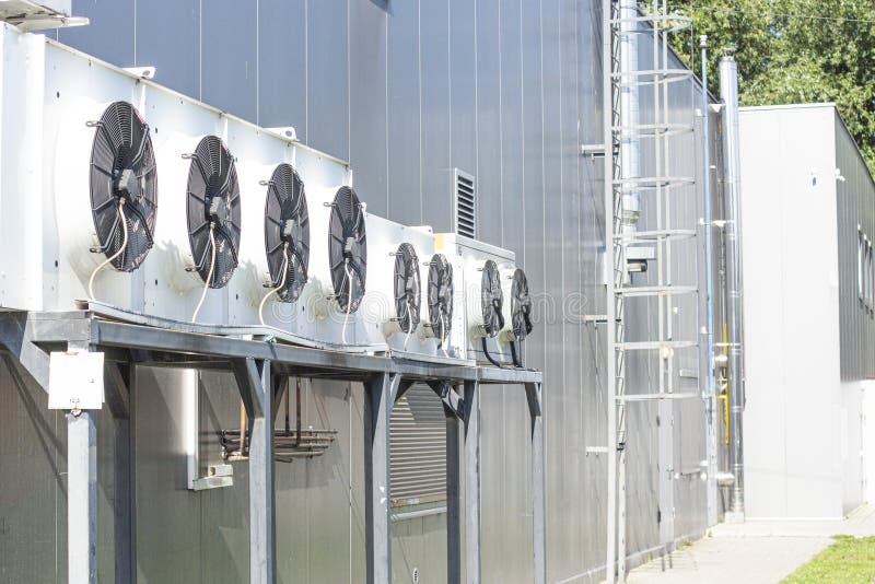 Cooling Fans Hang on the Wall of the Building Stock Image - Image of ...