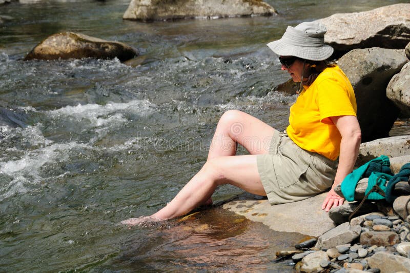 Cooling Your Feet in a Mountain Stream Stock Image - Image of feet ...