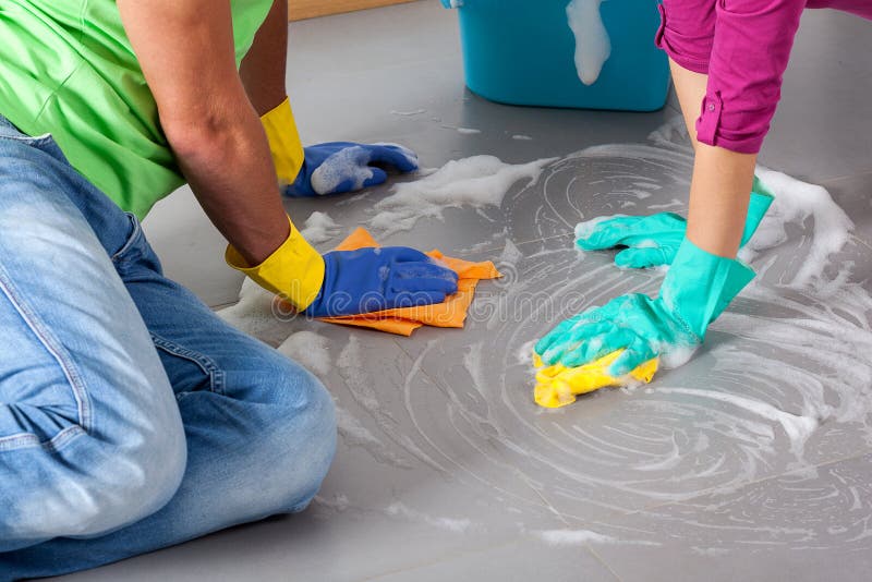 Cooperation in housework stock image. Image of floor - 35066993