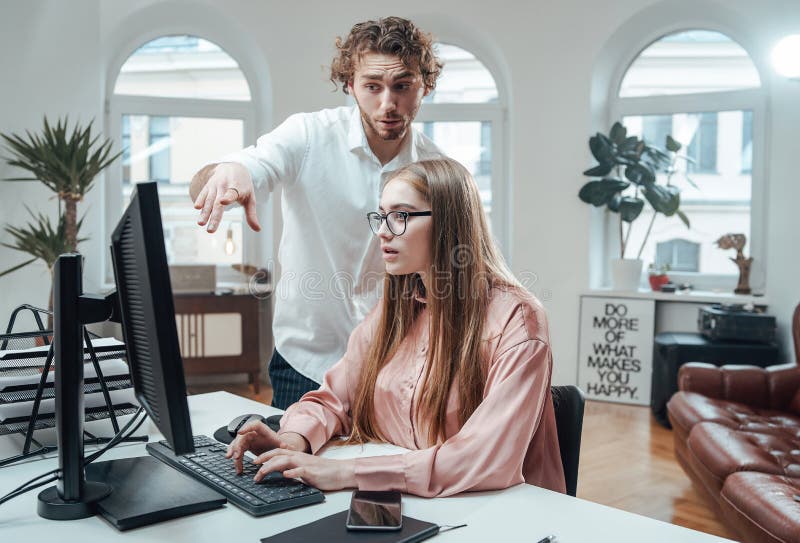 Cooperation of a Office Workers Which Use Computer in Office Stock ...