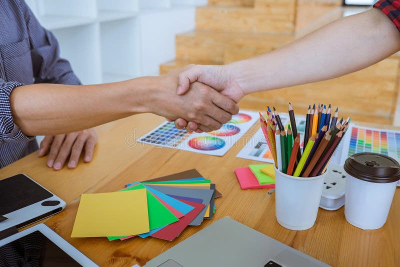 Cooperation of Young Creative Graphic Designer Working on Workspace and ...