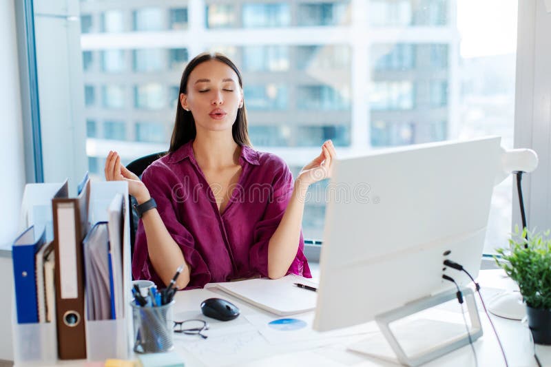 Coping with Stress at Work. Woman Office Worker Meditating at Workplace ...