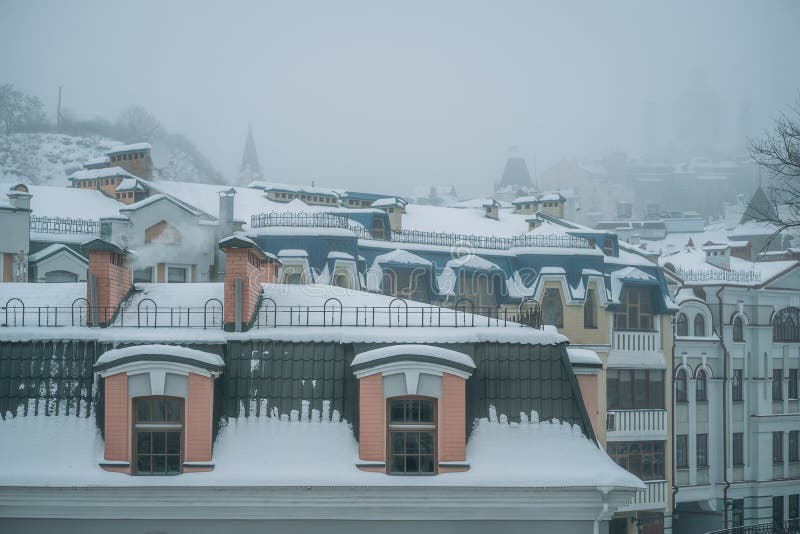 Copious Snowfall Over the City with the Roofs Stock Photo - Image of ...