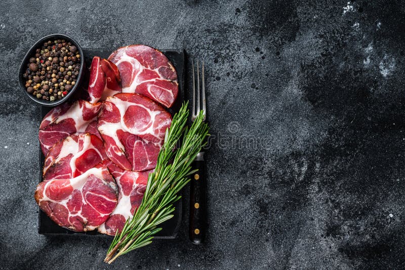 Coppa, Capocollo, Capicollo Cured Ham on Marble Board. Black Background ...