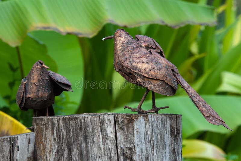 Copper bird with a sword stock image. Image of famous - 78780953