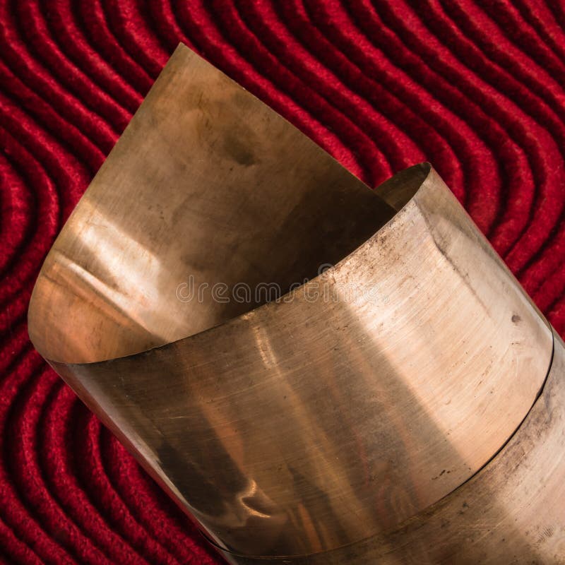 Copper Bronze Metallic Roll on Textured Pattern Red Cloth Background ...