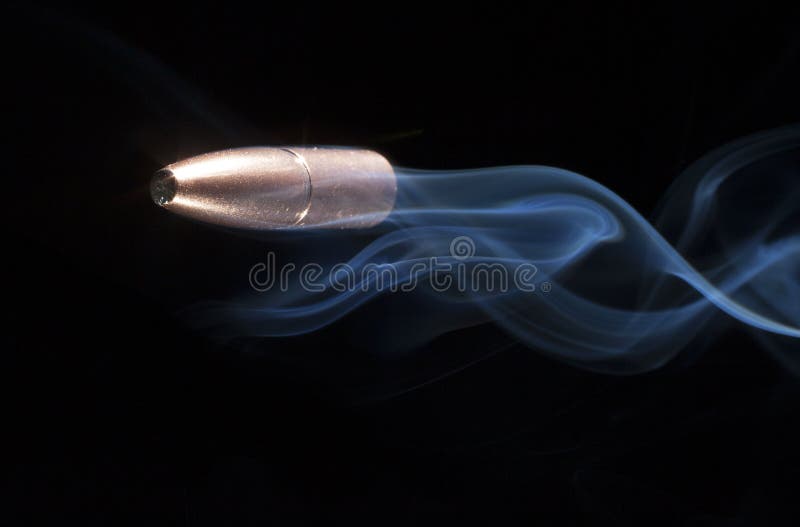 Copper Bullet with Smoke Behind Stock Image - Image of smoke, smoking ...