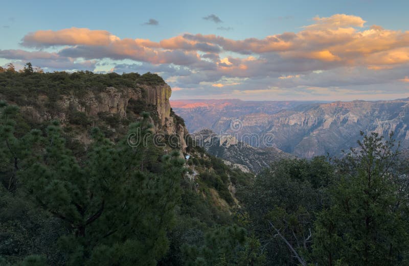 Copper Canyon Sunset with Lush Greenery and Dramatic Clouds Stock Image ...