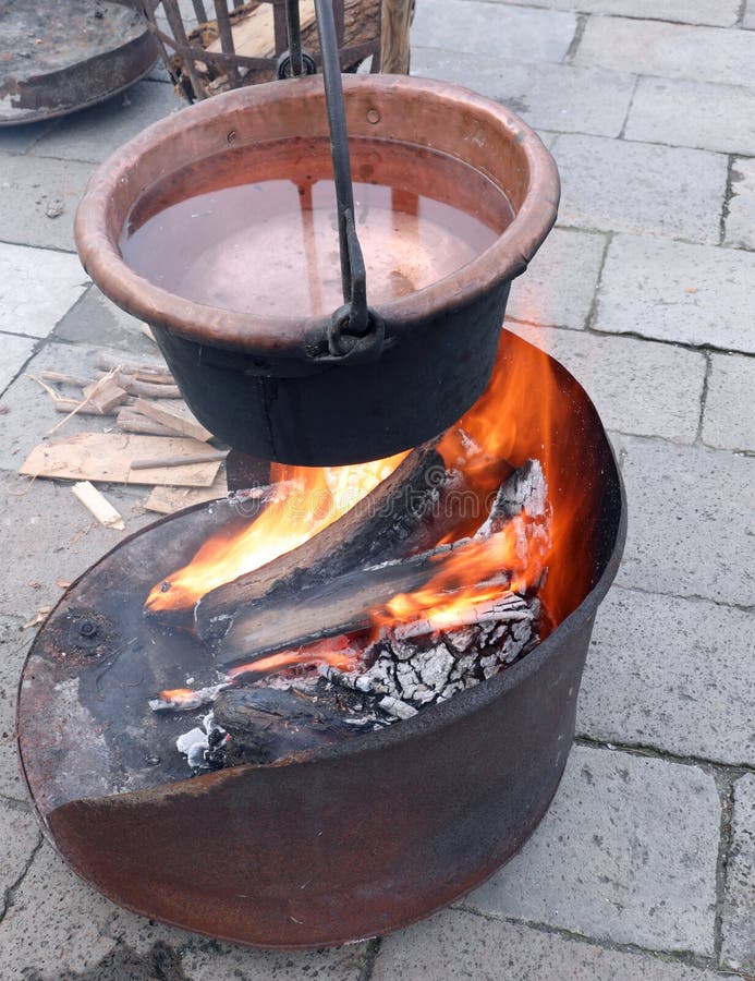 Cauldron with Boiling Water and a Large Wood Fire Stock Photo - Image ...