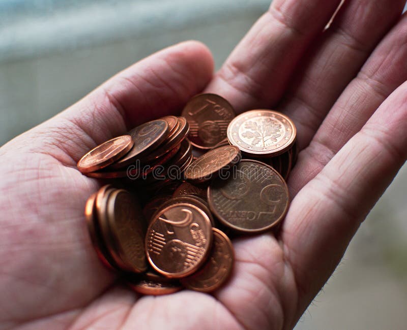 Cent coins in palm of hand stock image. Image of coin - 162036721