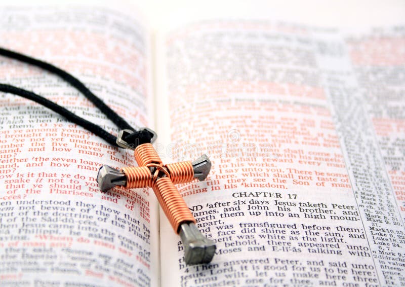 Copper Colored Cross on Open Bible Stock Photo - Image of christianity ...