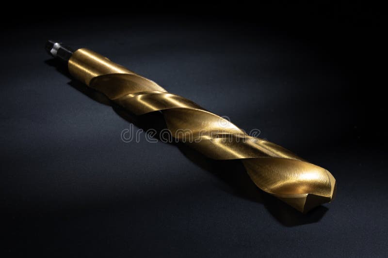 Copper Colored Drill Bit on Black Stock Photo - Image of metal ...